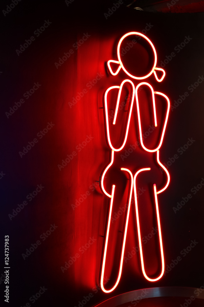 A picture sign of the girl sitting using for restroom, bathroom or ...