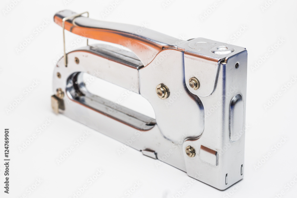 Silver Stapler gun on white background Stock-Foto | Adobe Stock