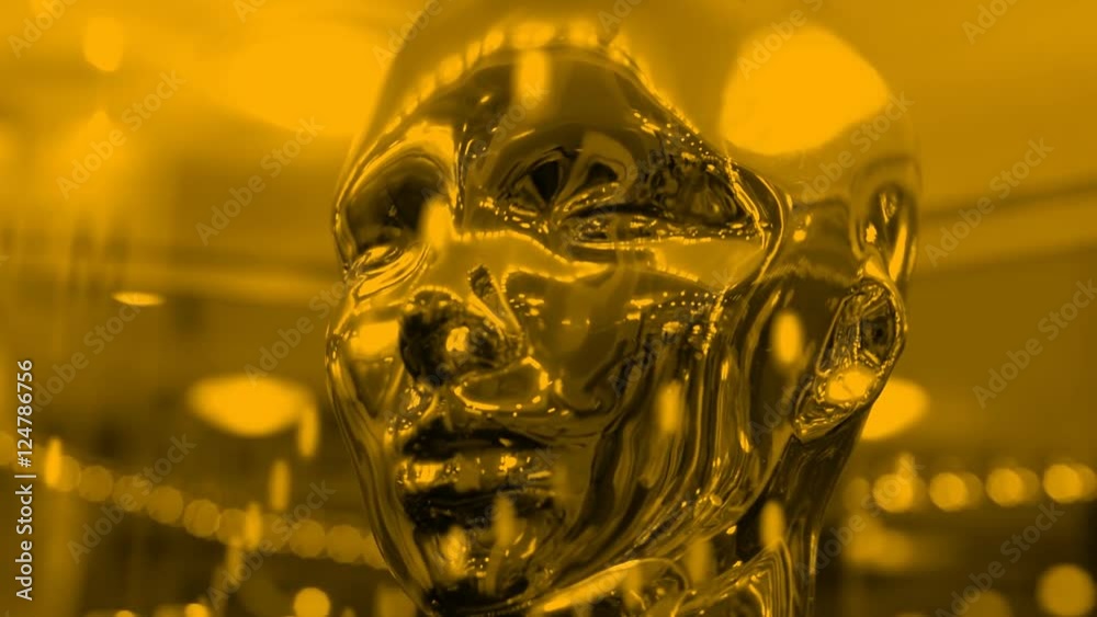 Silver color, mirror surfaces of face humanoid ( human ) reflects ...