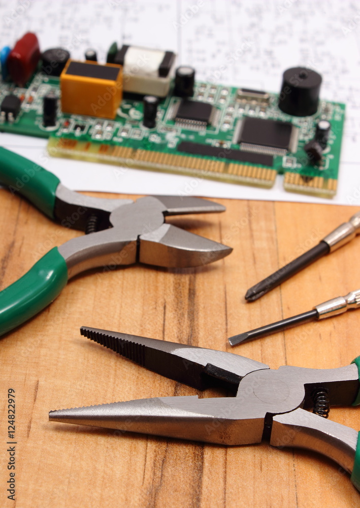 Printed circuit board. precision tools and diagram of electronics ...
