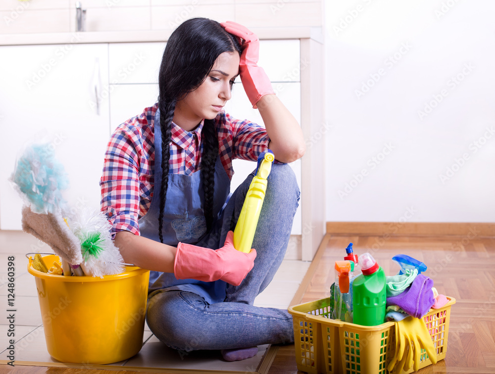 Frustrated cleaning lady Stock Photo | Adobe Stock