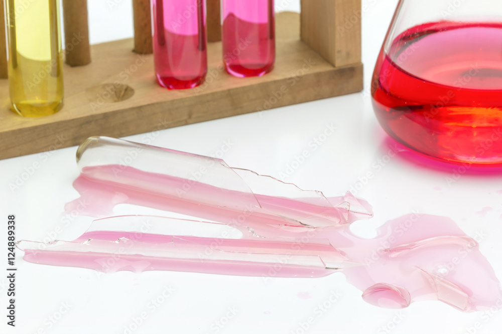 liquid chemical spilled from laboratory glassware Stock Photo | Adobe Stock