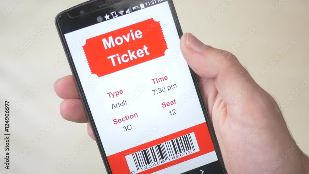 Movie theatre ticket showing on a smartphone screen. Digital eTicket ...