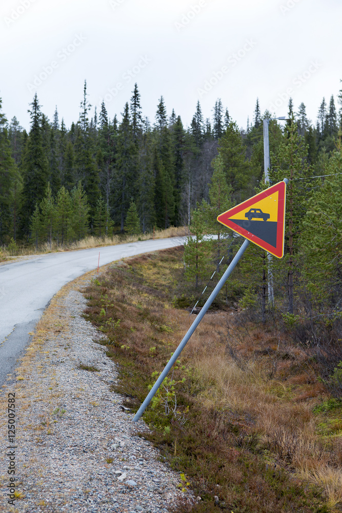 Traffic sign warning about high rise on a curvy road. Stock Photo ...