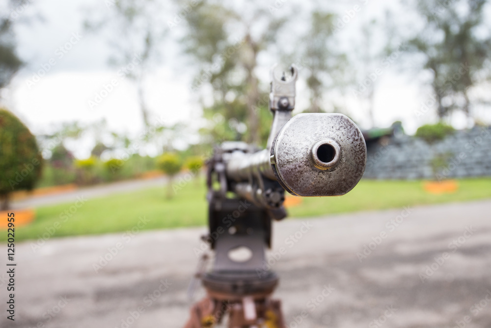 Front of hole antique machine gun Stock Photo | Adobe Stock