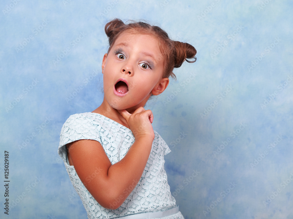 Funny surprising and very excited kid girl looking in camera on Stock ...