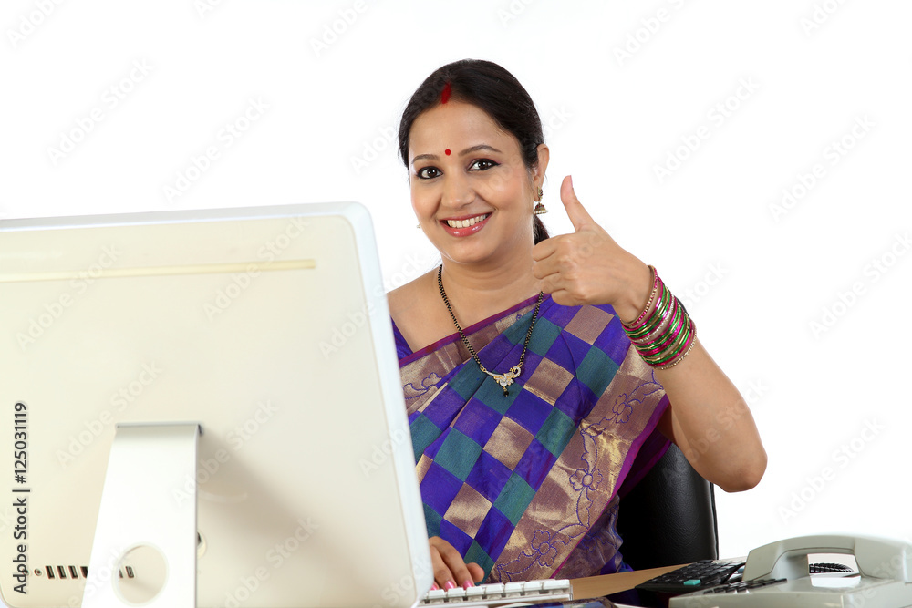 Successful traditional Indian woman making thumbs up gesture Stock ...