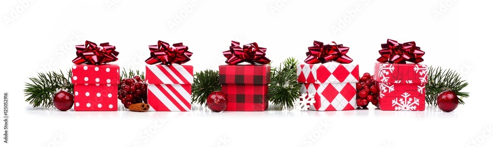 Christmas border of red and white gift boxes and branches isolated on a ...