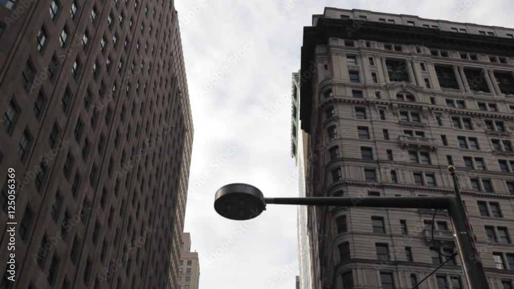 Classical skyscrapers in NYC New York City Manhattan street dolly shot ...