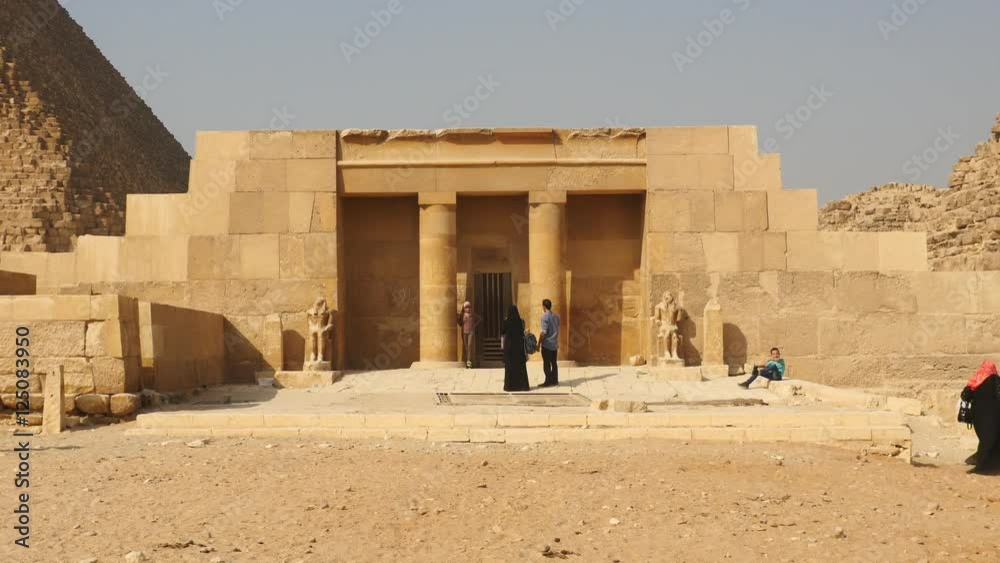 Zoom Out - Tourists visit The Great Pyramids of Giza / Pharaohs House ...