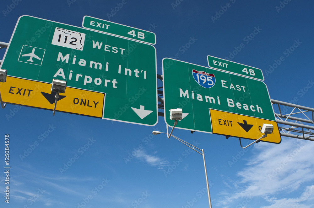 Interstate signs marking the way to Miami Beach and Miami International ...