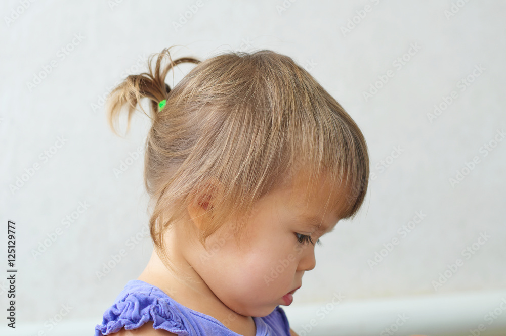 Child girl first hair style - tiny tail, profile of baby girl ch Stock ...
