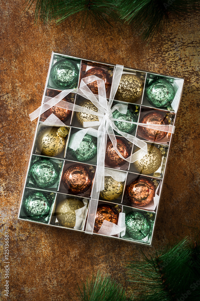 Christmas balls in a box on rusty background and fir branches Stock ...