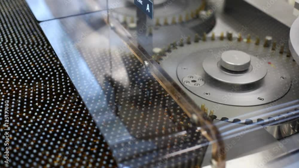 Automatic optical inspection machine, inspects vials and ampoules for ...