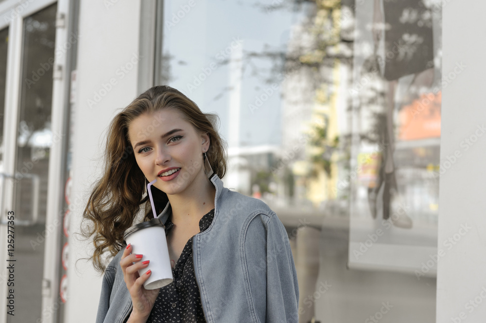 Pretty girl drinking beverage Stock Photo | Adobe Stock