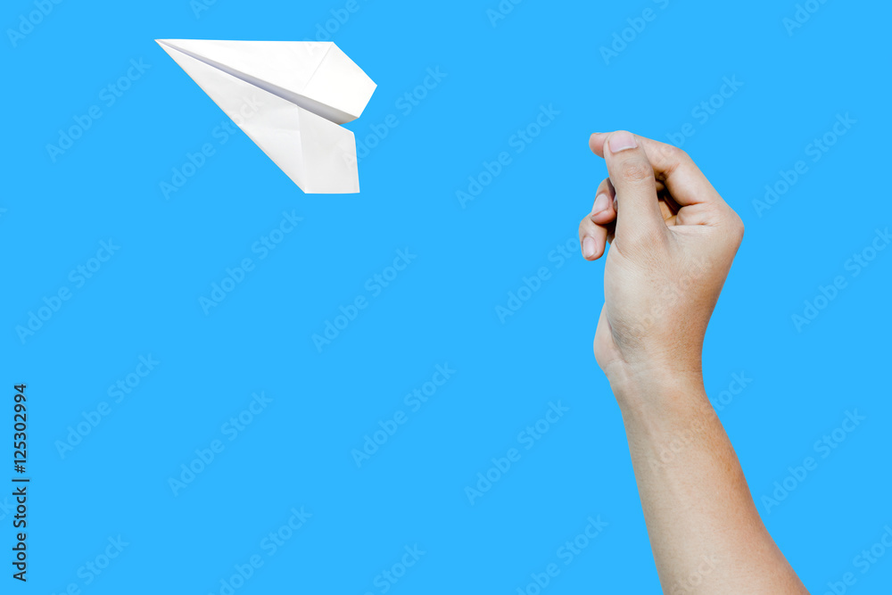 paper aero plane ready to take off as a conceptual picture on blue ...
