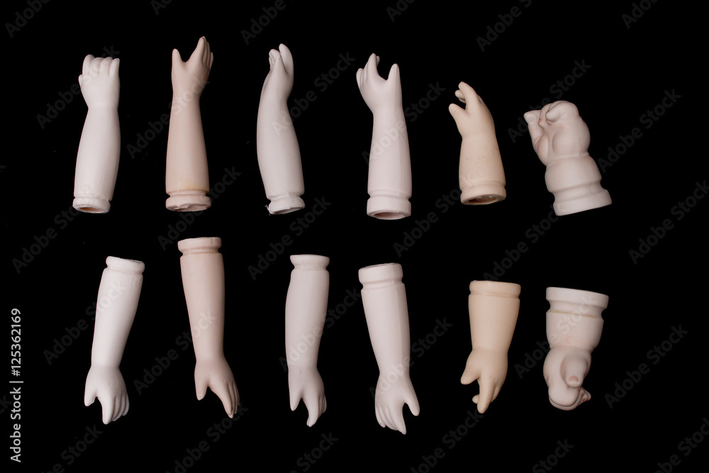 Broken Doll Body Parts Hands and Arms on Black Background Stock Photo ...