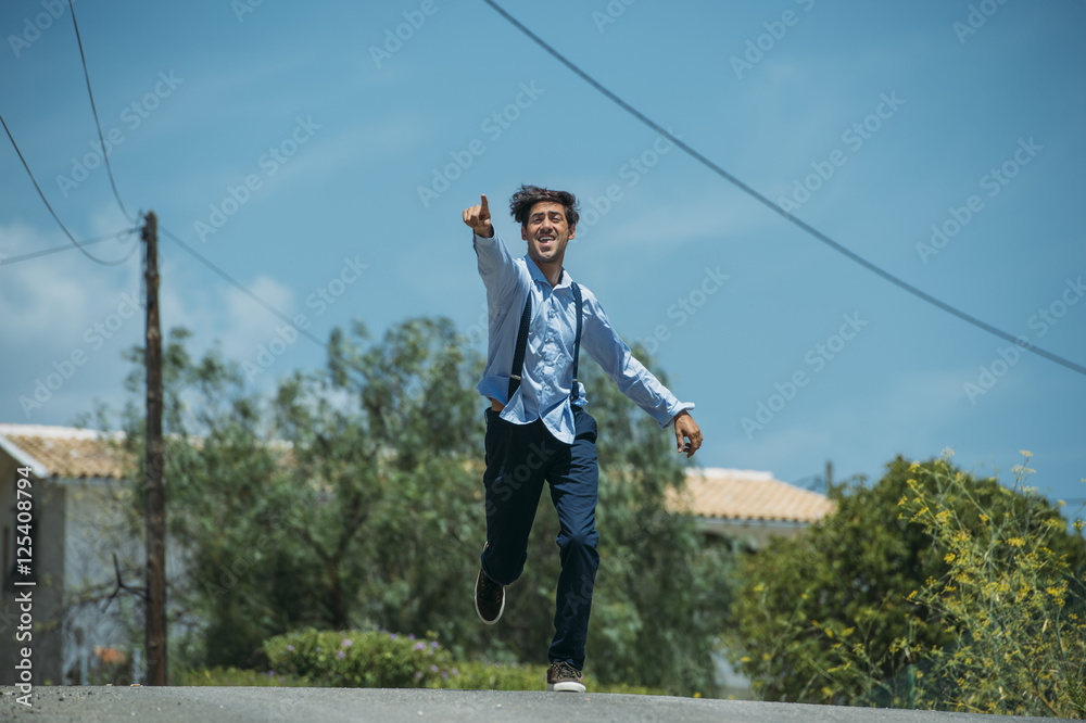 Chico corriendo y voceando Stock Photo | Adobe Stock