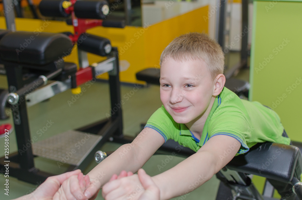 boy is training in the gym Stock Photo | Adobe Stock