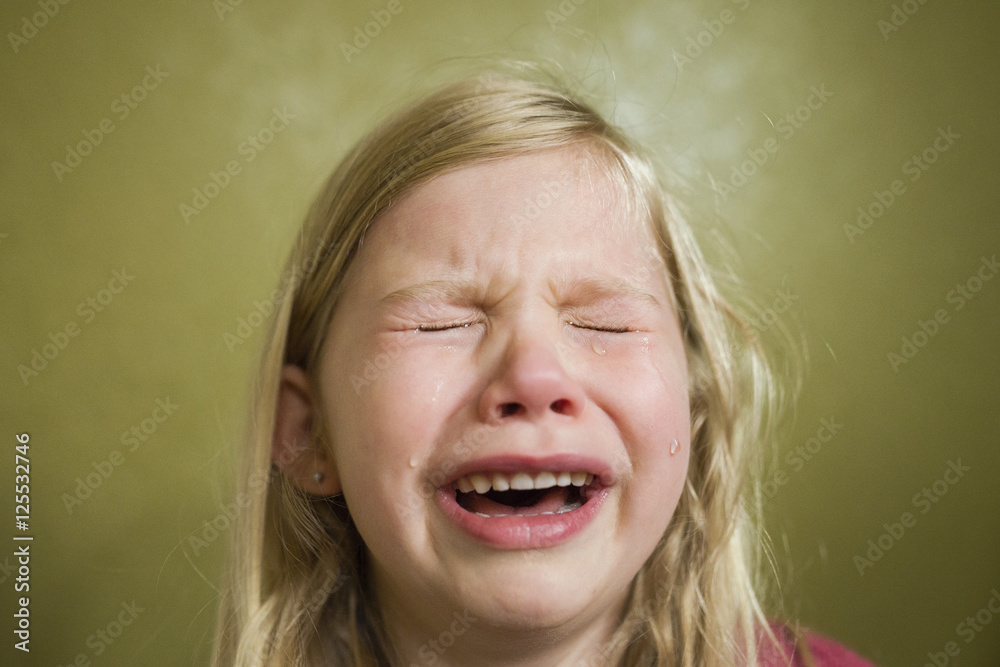 Sad girl crying at home Stock Photo | Adobe Stock
