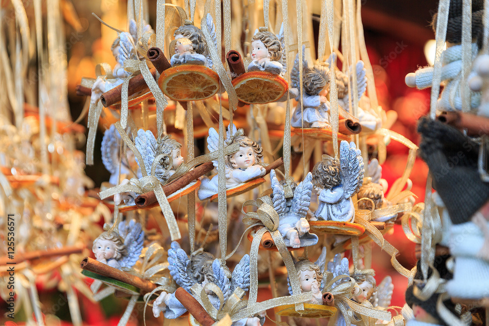 Colorful close up details of christmas fair market. Angels ball with a ...
