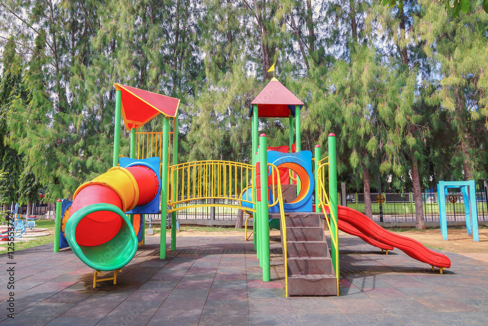 outdoor colorful playground with tree background Stock Photo | Adobe Stock