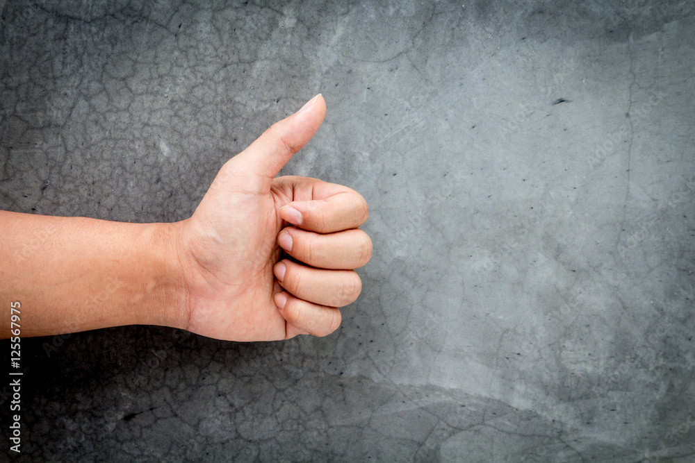 Hand thump up sign Stock Photo | Adobe Stock