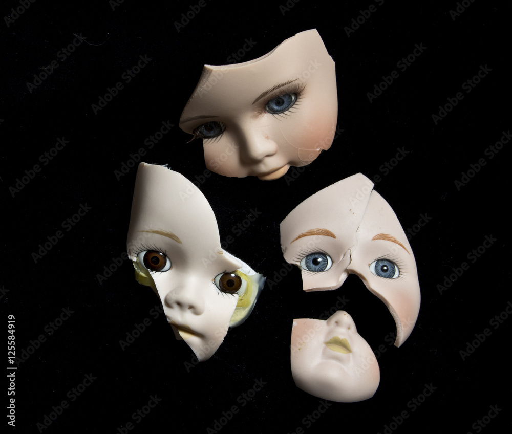 Broken Doll Face and Head on Black Background Stock Photo | Adobe Stock