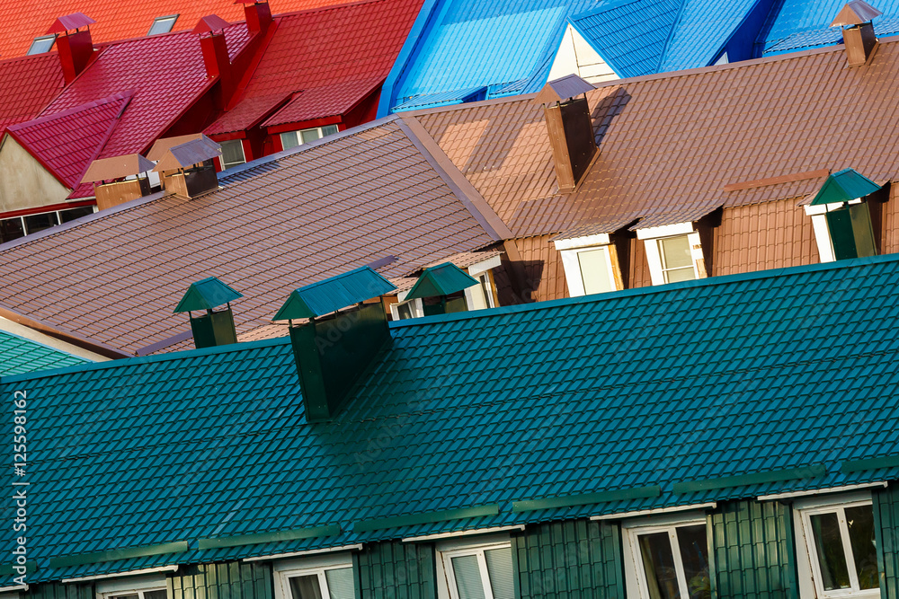 Colorful high-rise buildings/ The sun reflected in the Windows of ...