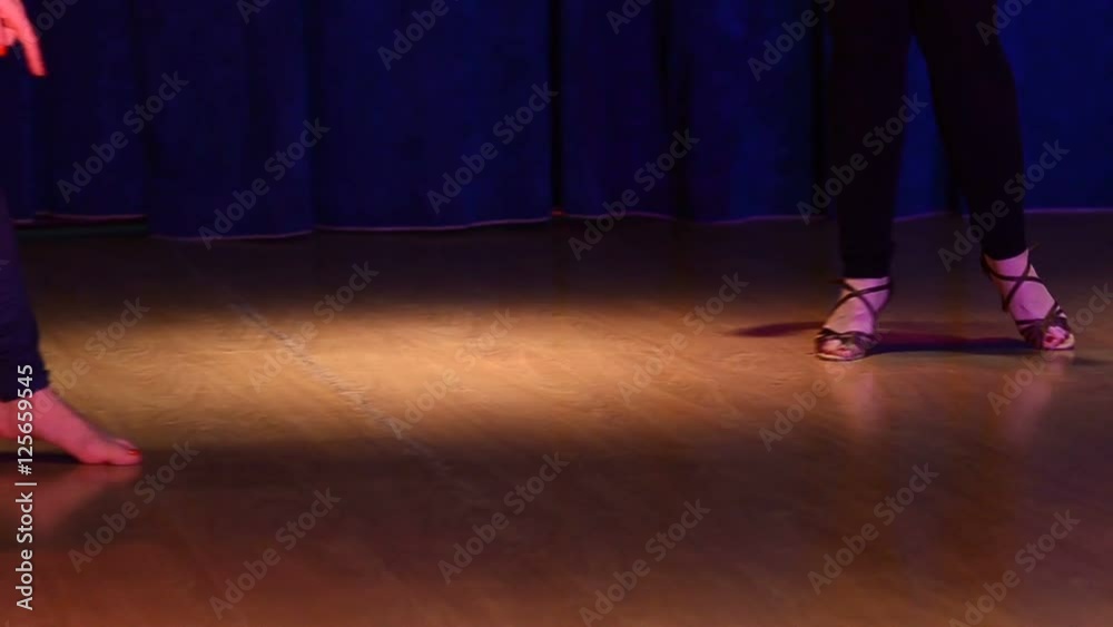 female feet, dancing on stage, group dance, barefoot and in the shoe ...