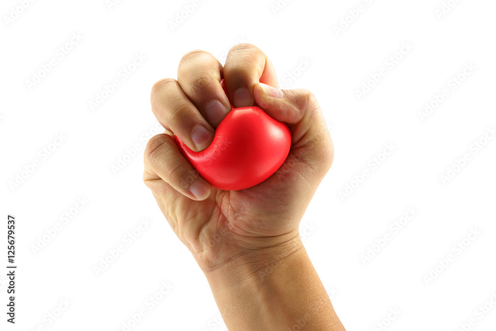 Hand squeezing a stress ball on white background Stock Photo | Adobe Stock