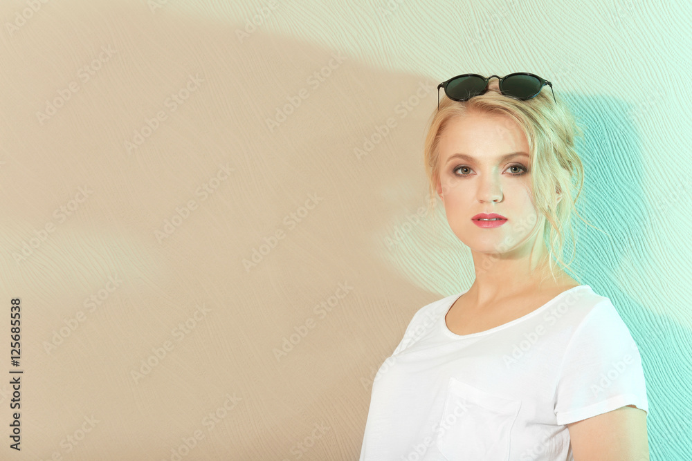 Beautiful fashion girl on color background Stock 사진 | Adobe Stock