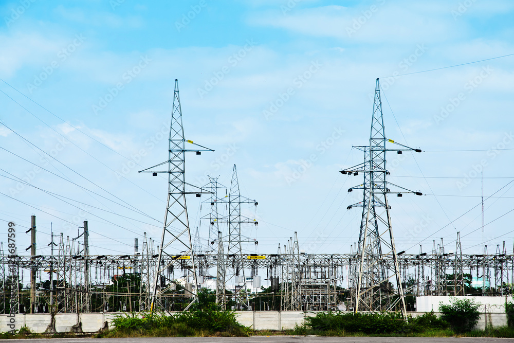 High voltage power lines with electricity pylons at blue sky. Stock ...