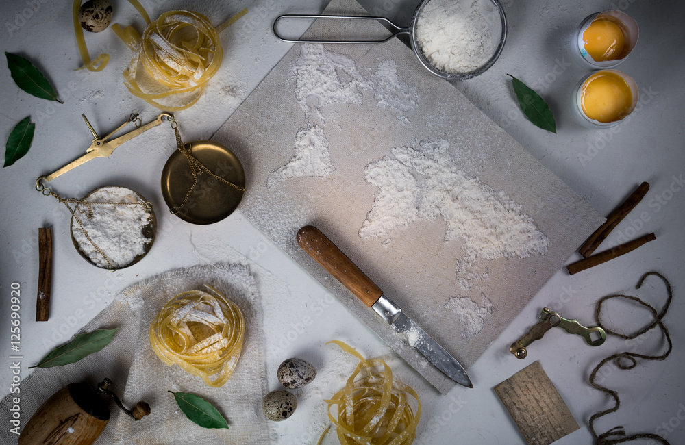 wheat flour in the form of a world map. Food, scales vintage. top view ...