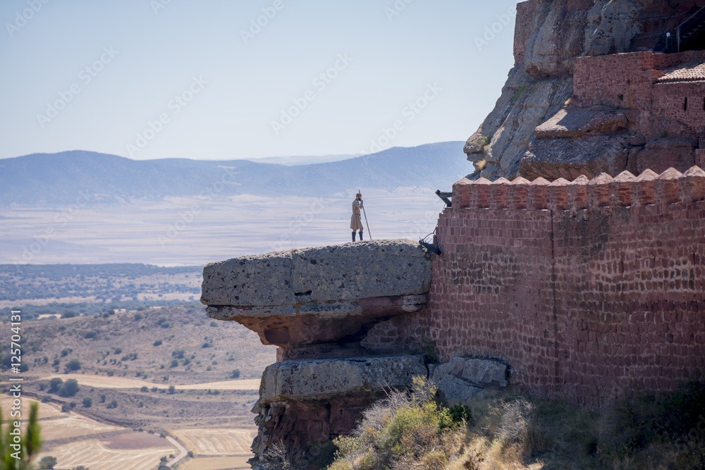 medieval sentry standing guard on the ramparts of a castle Stock Photo ...