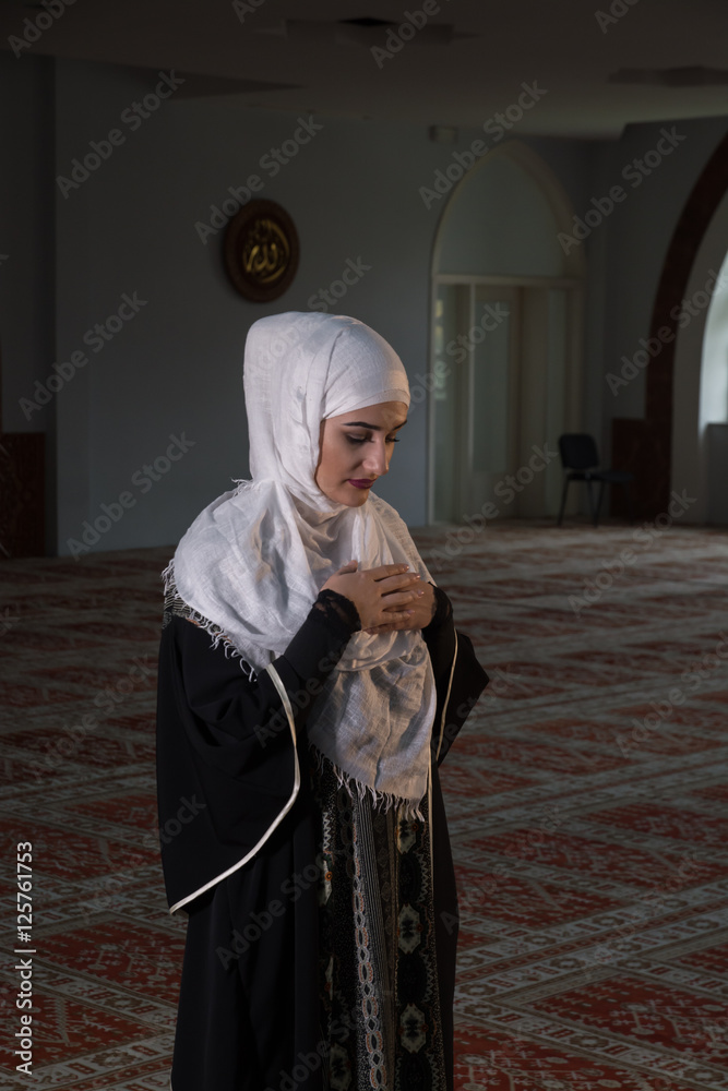 Muslim Girl Praying In Mosque Stock Photo | Adobe Stock