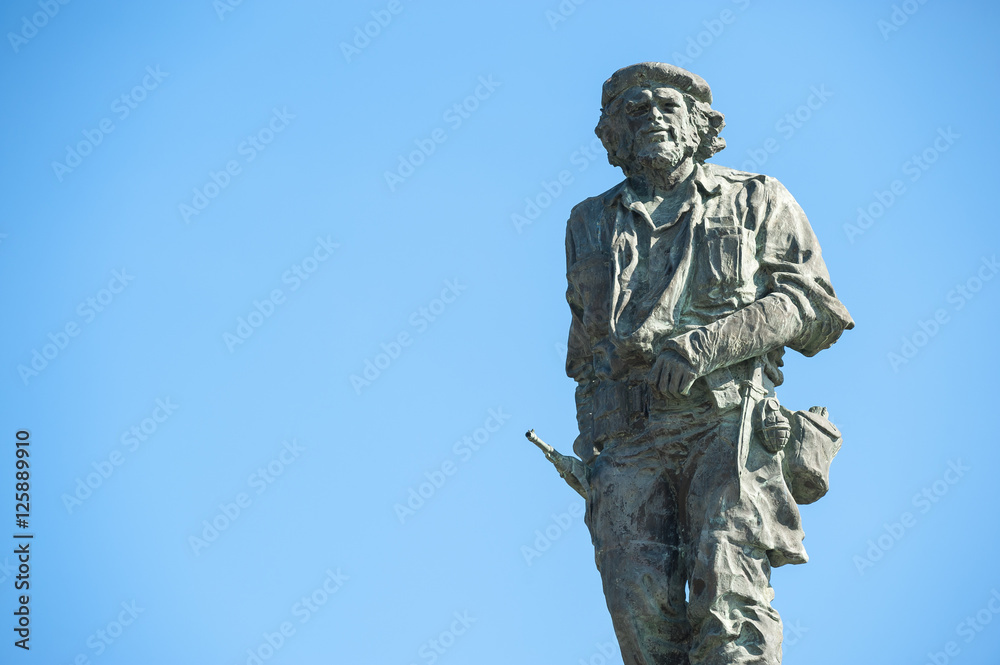 Statue of Cuban revolutionary Che Guevara stands in blue sky at a ...