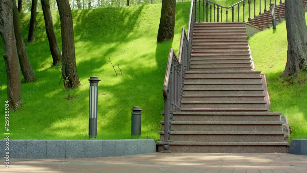 Granite stairs in park. Staircase in green park. Stone stairs in city ...
