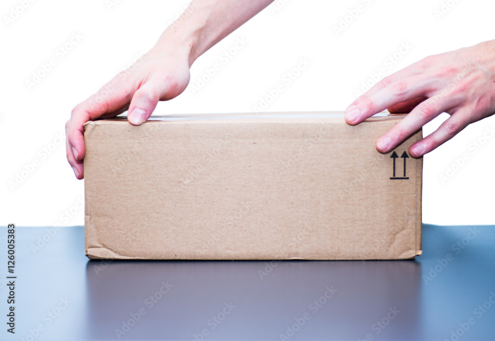 Paket und Männerhände, freigestellt Stock Photo | Adobe Stock