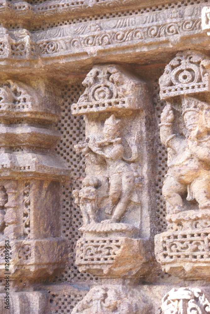 Devadasis, temple dancers, carvings on weathered red sandstone ...