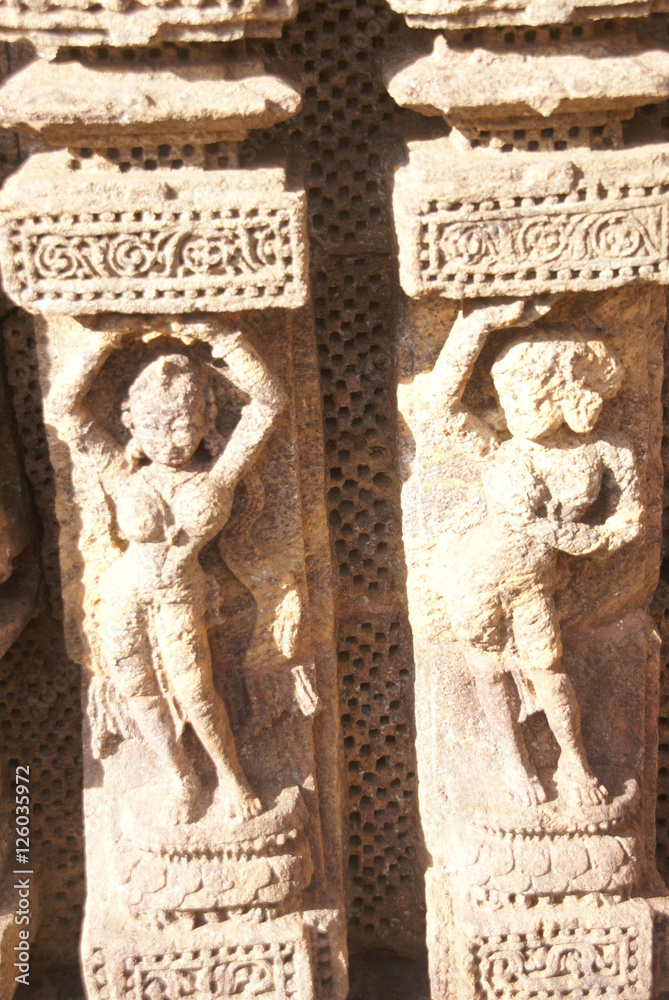 Devadasis, temple dancers, carvings on weathered red sandstone ...