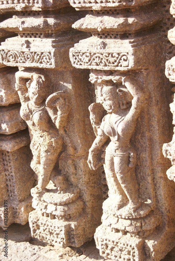 Devadasis, temple dancers, carvings on weathered red sandstone ...