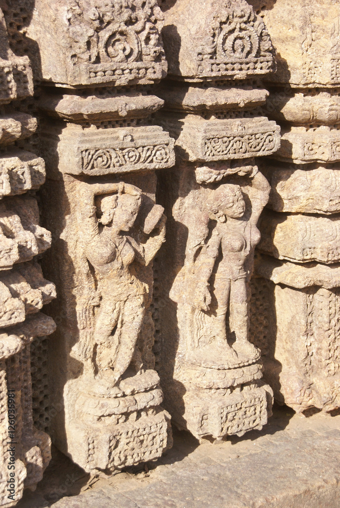 Devadasis, temple dancers, carvings on weathered red sandstone ...