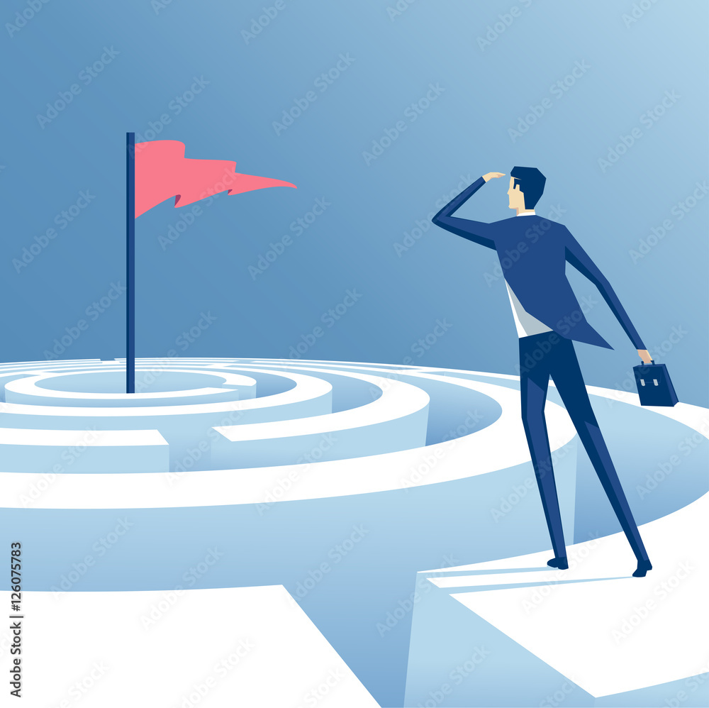 businessman looking for a way to reach the goal through the maze ...