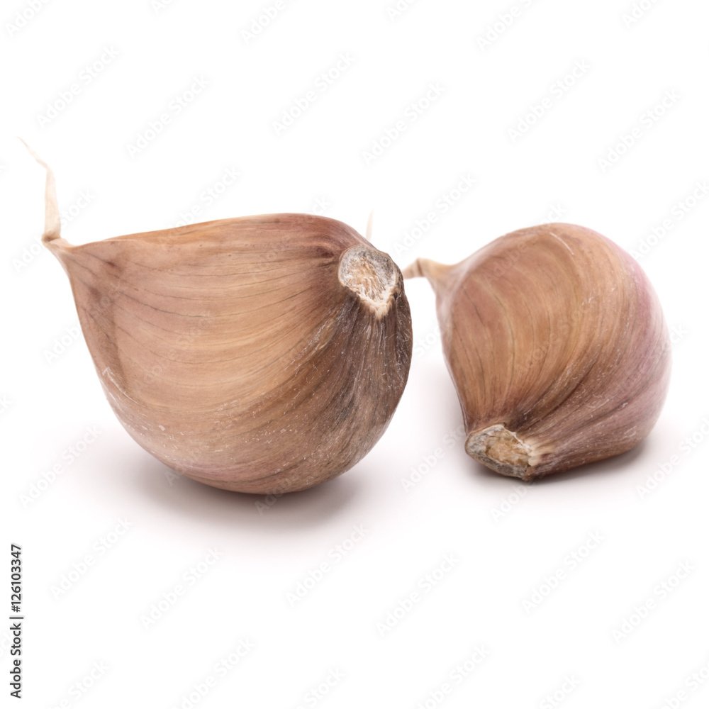 Two garlic cloves isolated on white background cutout Stock Photo ...