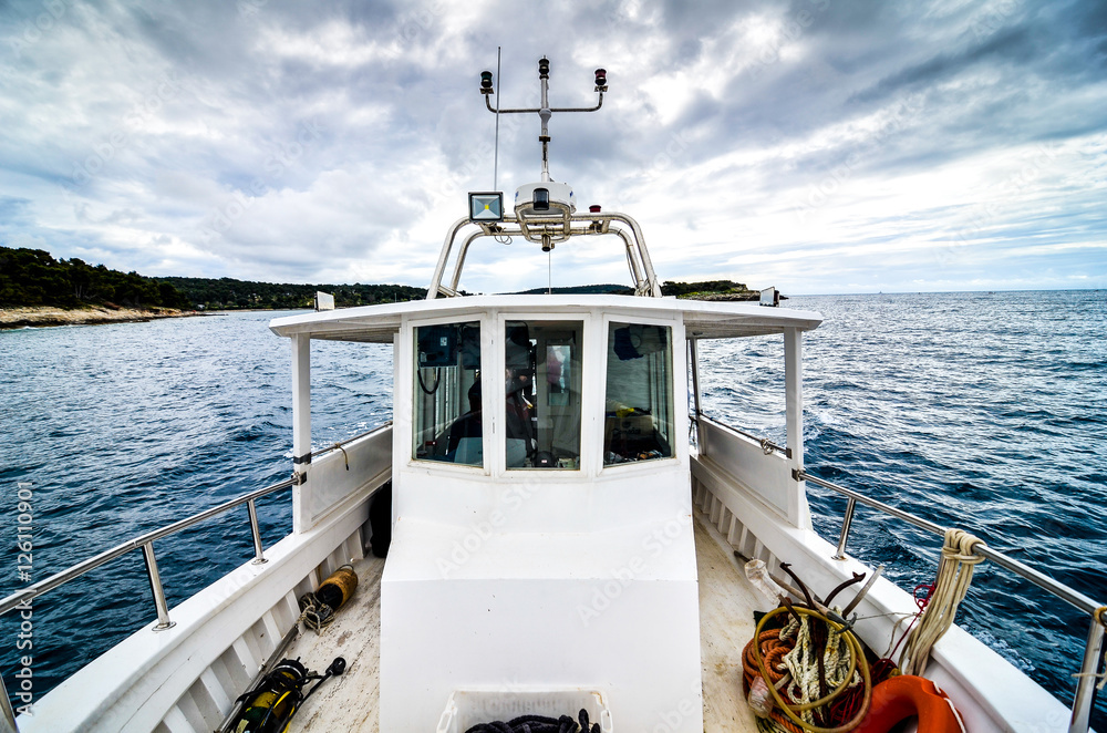 Industrial fishing boat ship on the sea with dramatic clouds. Stock ...