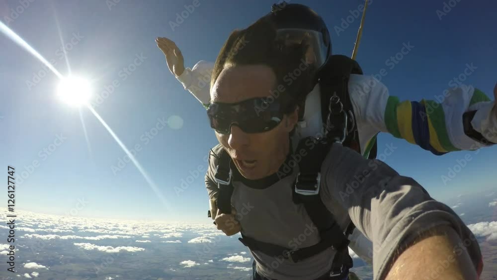 Skydiving tandem jump from the plane Stock Video | Adobe Stock
