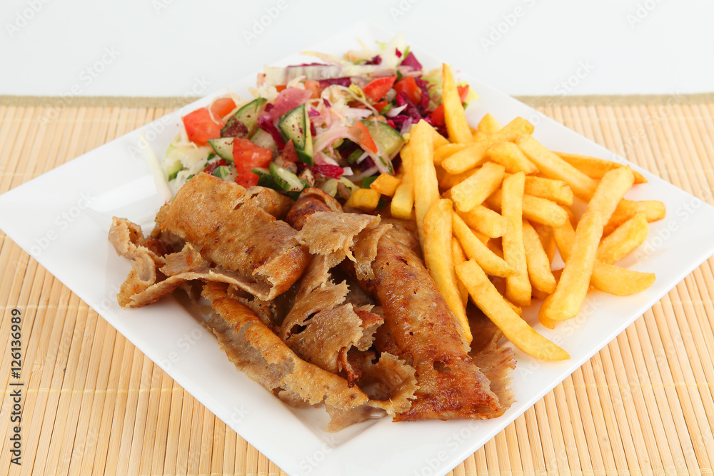 Döner mit Pommes und Salat Stock Photo | Adobe Stock