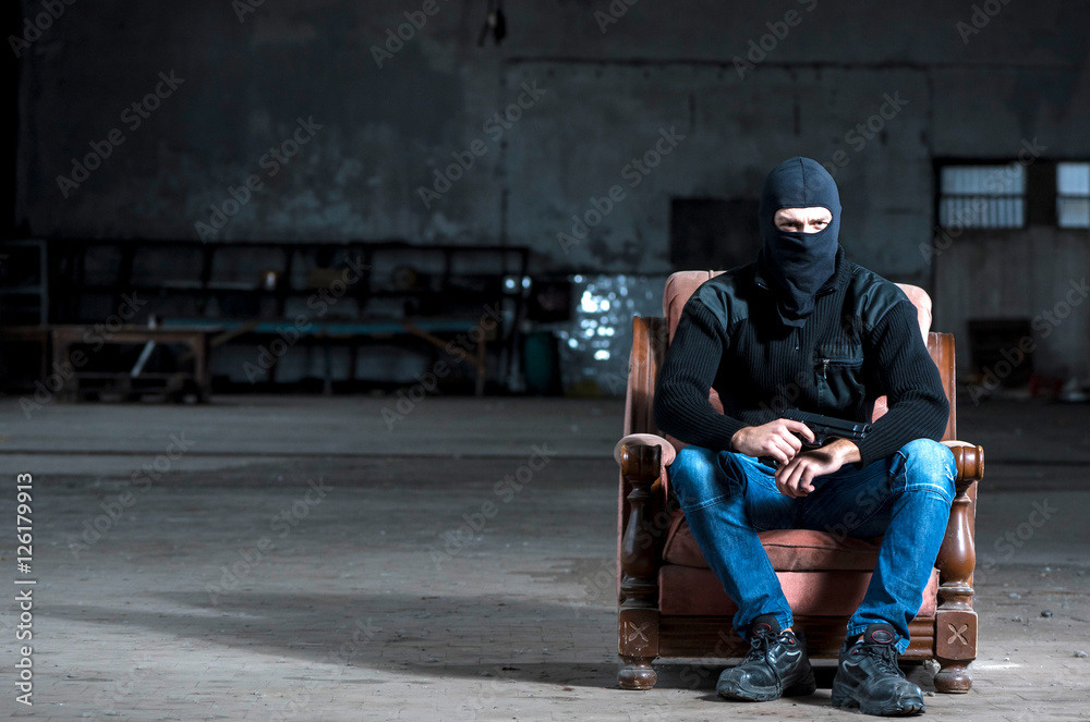 The terrorist with gun Stock Photo | Adobe Stock