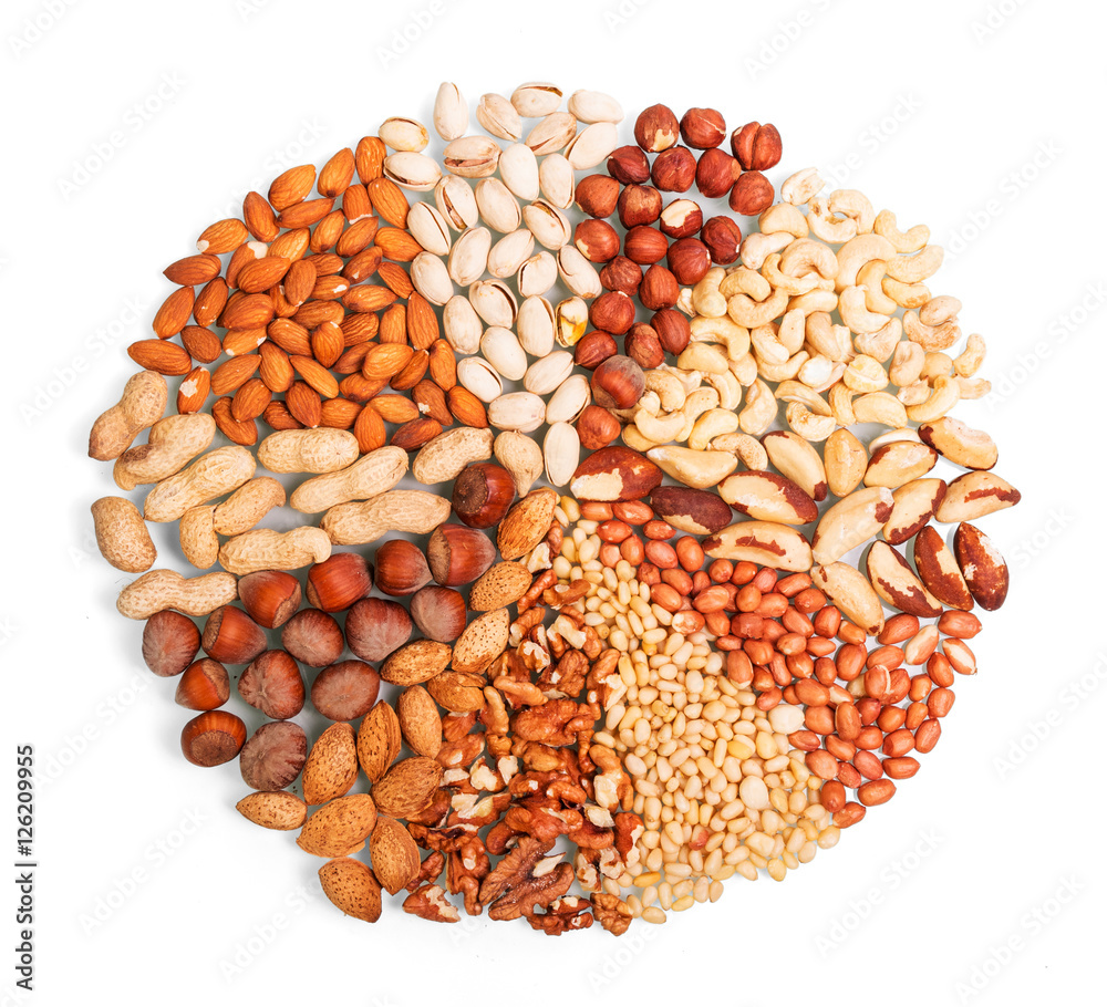 Various whole and peeled nuts isolated on white. Stock Photo | Adobe Stock